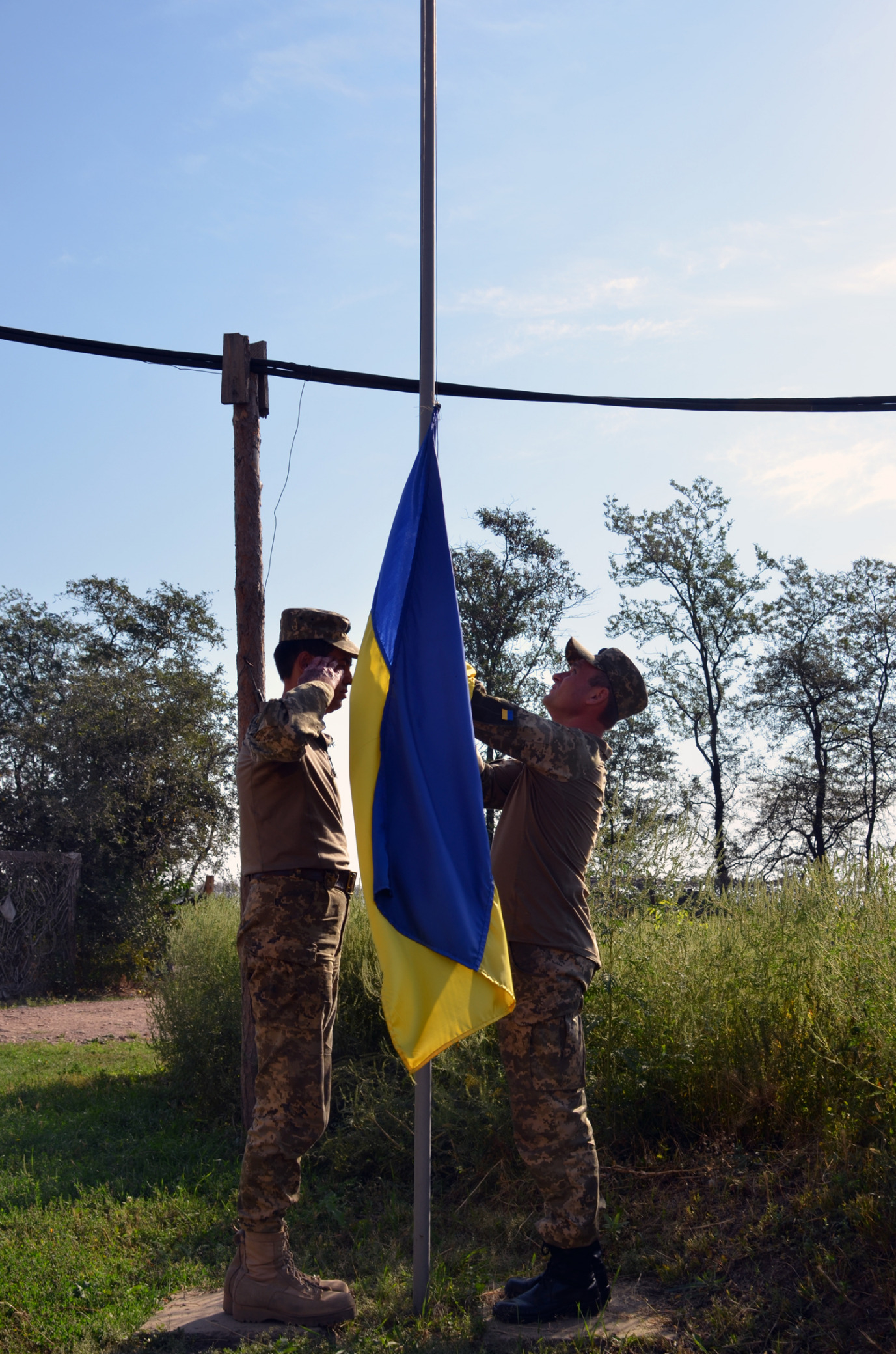 National flag hoisted above every military position along contact line ...
