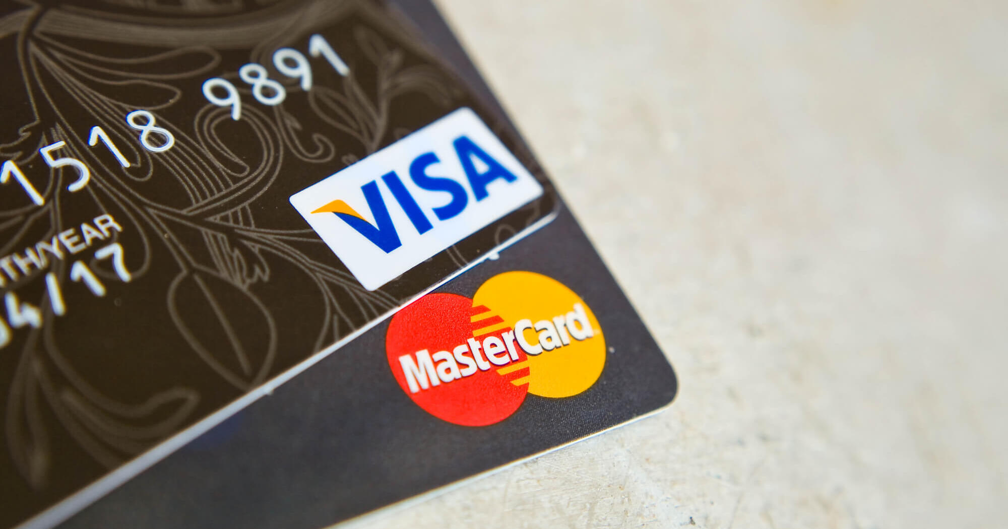 Visa торік збільшила свою частку на ринку України до 45,6%, Mastercard – скоротила до 53,9% ...